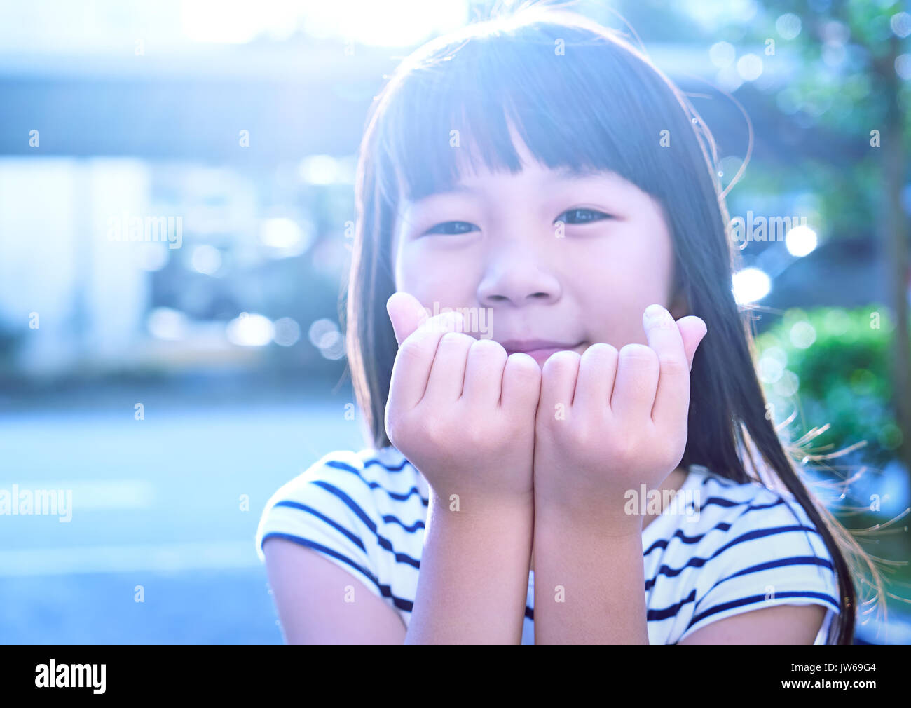 Beautiful girl show love sign hi-res stock photography and images - Alamy