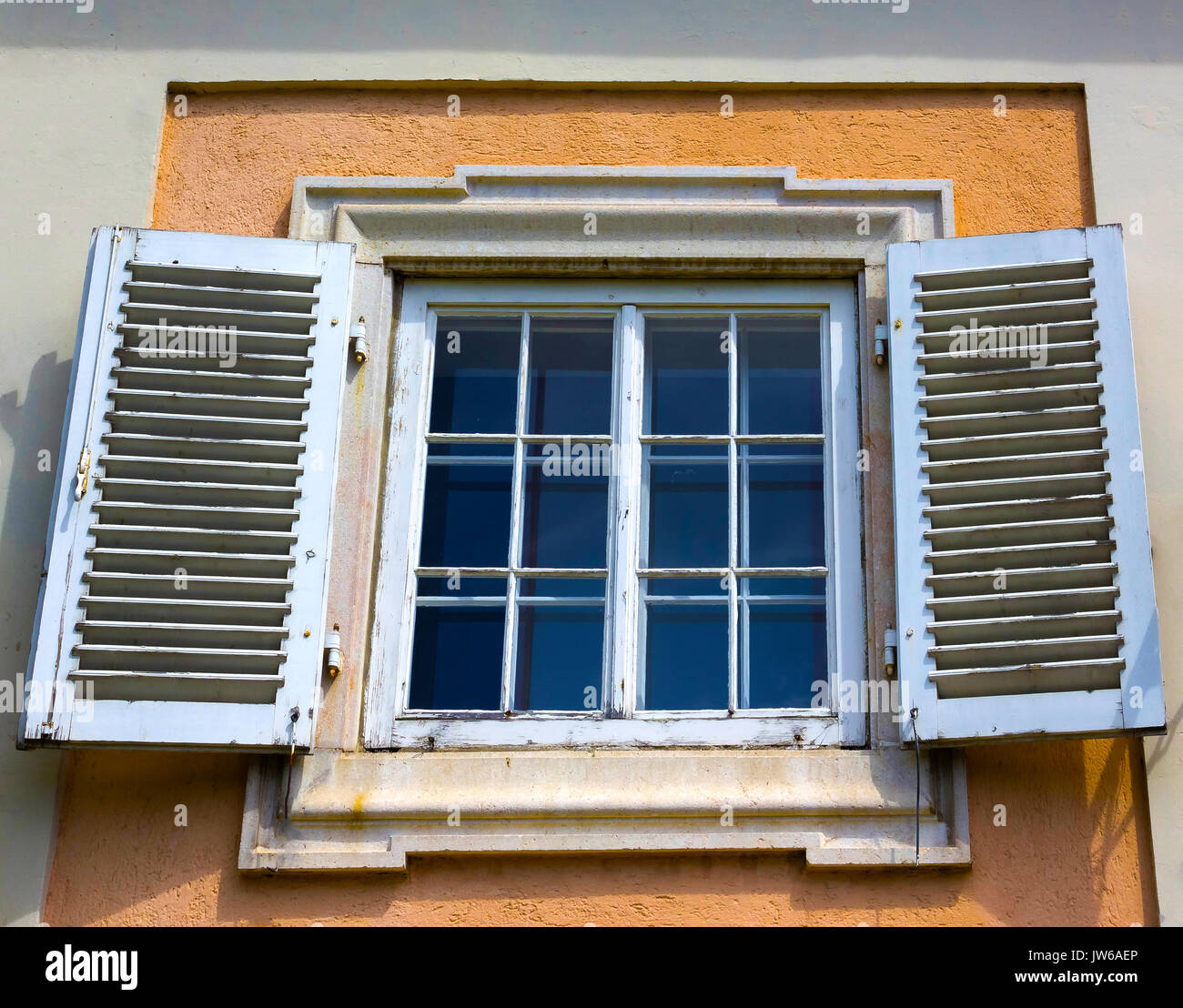 The typical view of a window with open shuttersin Stock Photo - Alamy