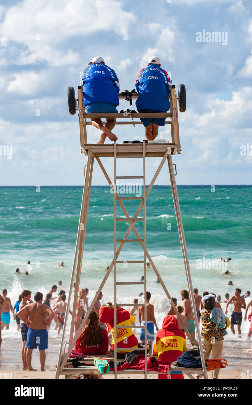 Lifeguards watching swimmers on the "Grand Plage" beach of Biarritz ...