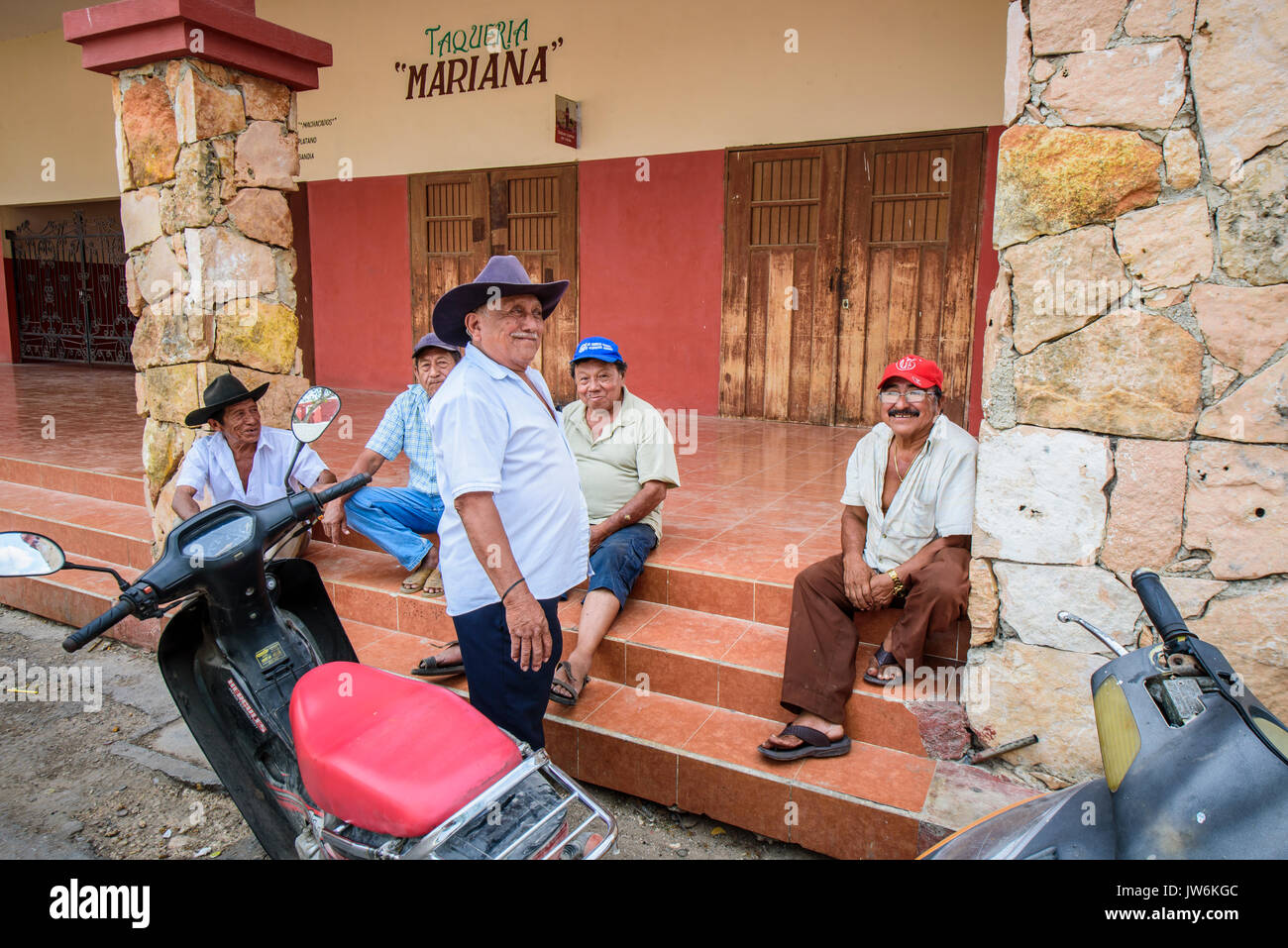 Local people sitting in the exterior of central market of Teabo ...
