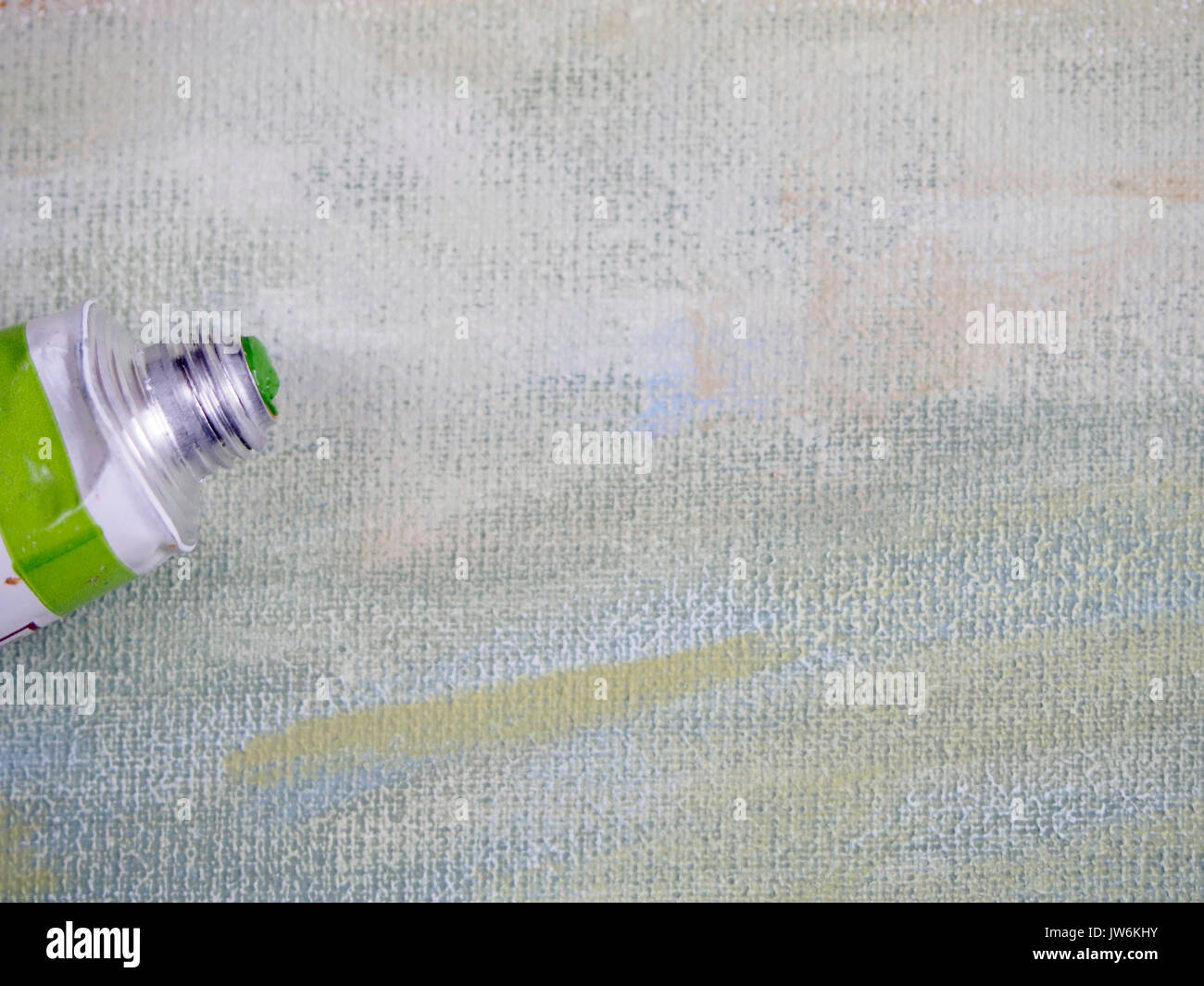 Canvas with paint tube Stock Photo - Alamy