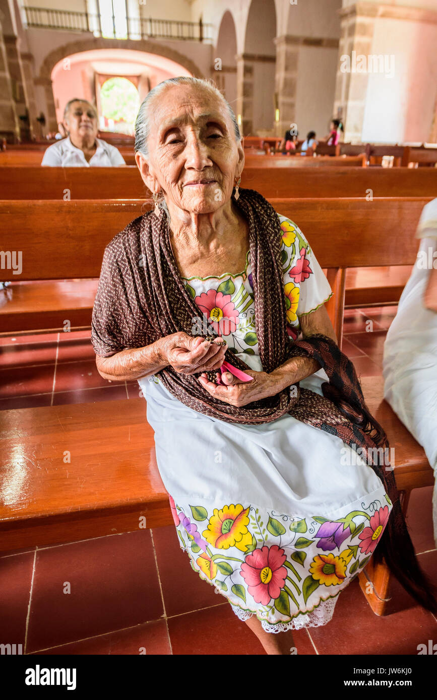 Women praying in the church of the convent of Mama, Yucatan (Mexico ...