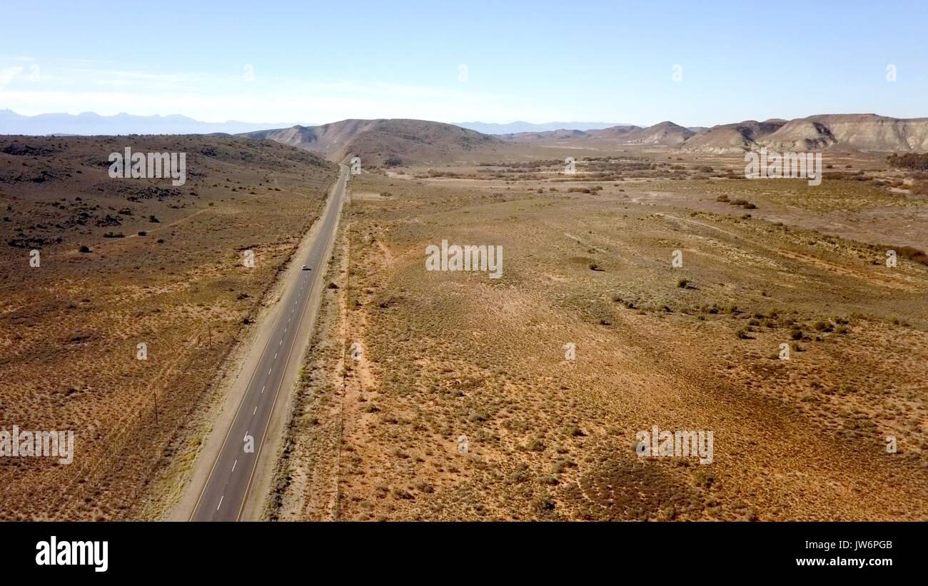 Car driving down rural road hi-res stock photography and images - Alamy