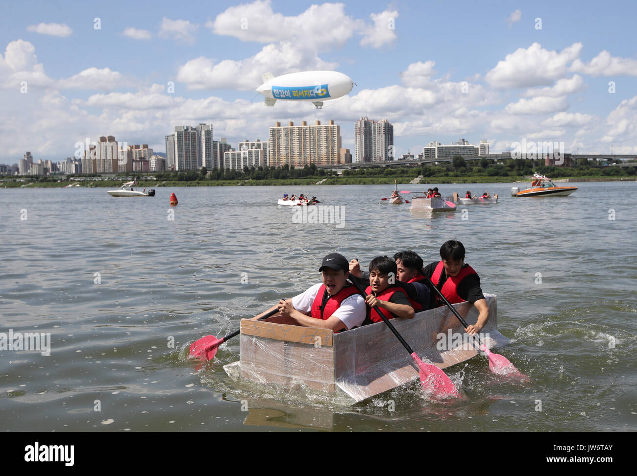 Paper ship-riding contest A team rows in its paper ship in an annual ...