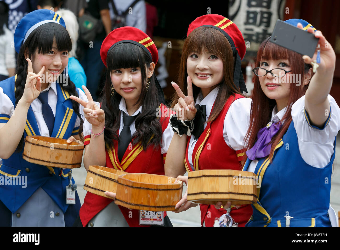 Tokyo, Japan. 11th August, 2017. Maid cafe waitresses pose for a selfie ...