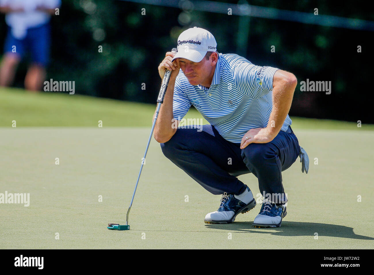 August 10, 2017: Jim Herman of the United States checks for a line on ...