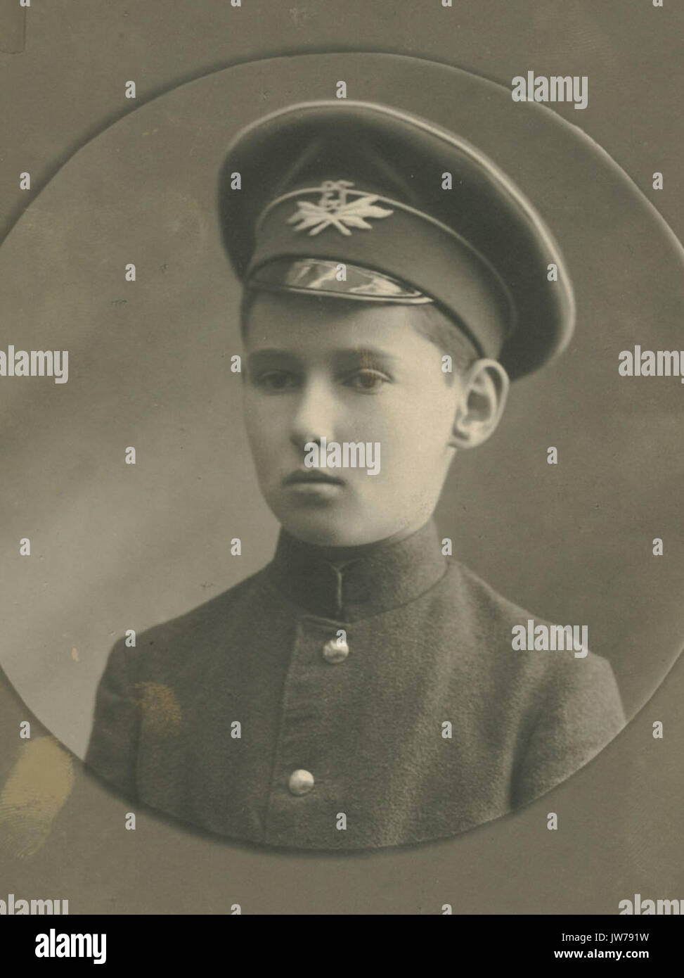Arnold Ross as young boy in school uniform Stock Photo - Alamy