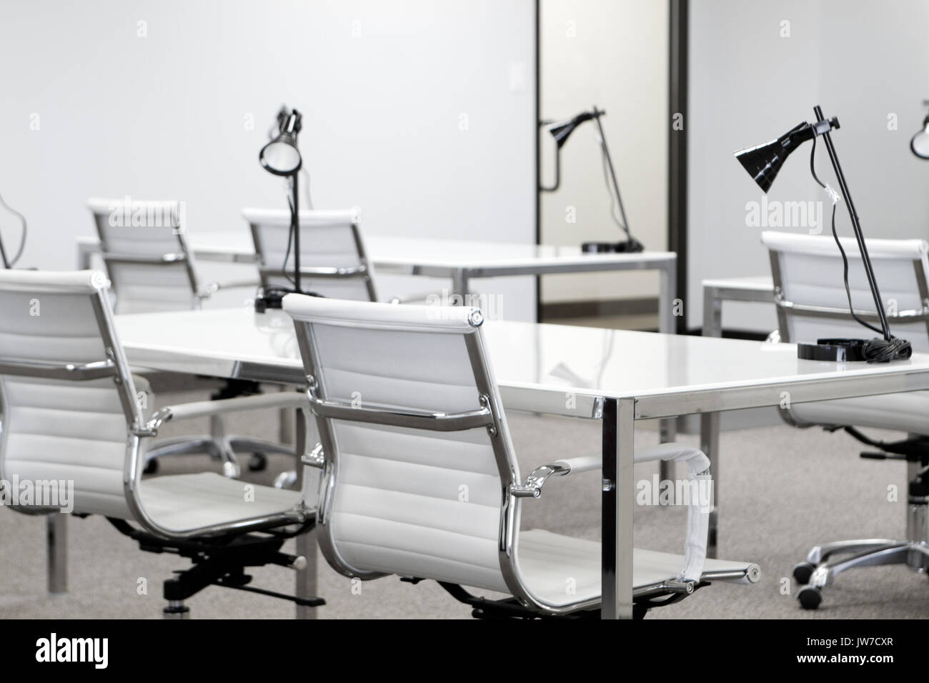 Modern Office Room With White Walls Stock Photo - Alamy