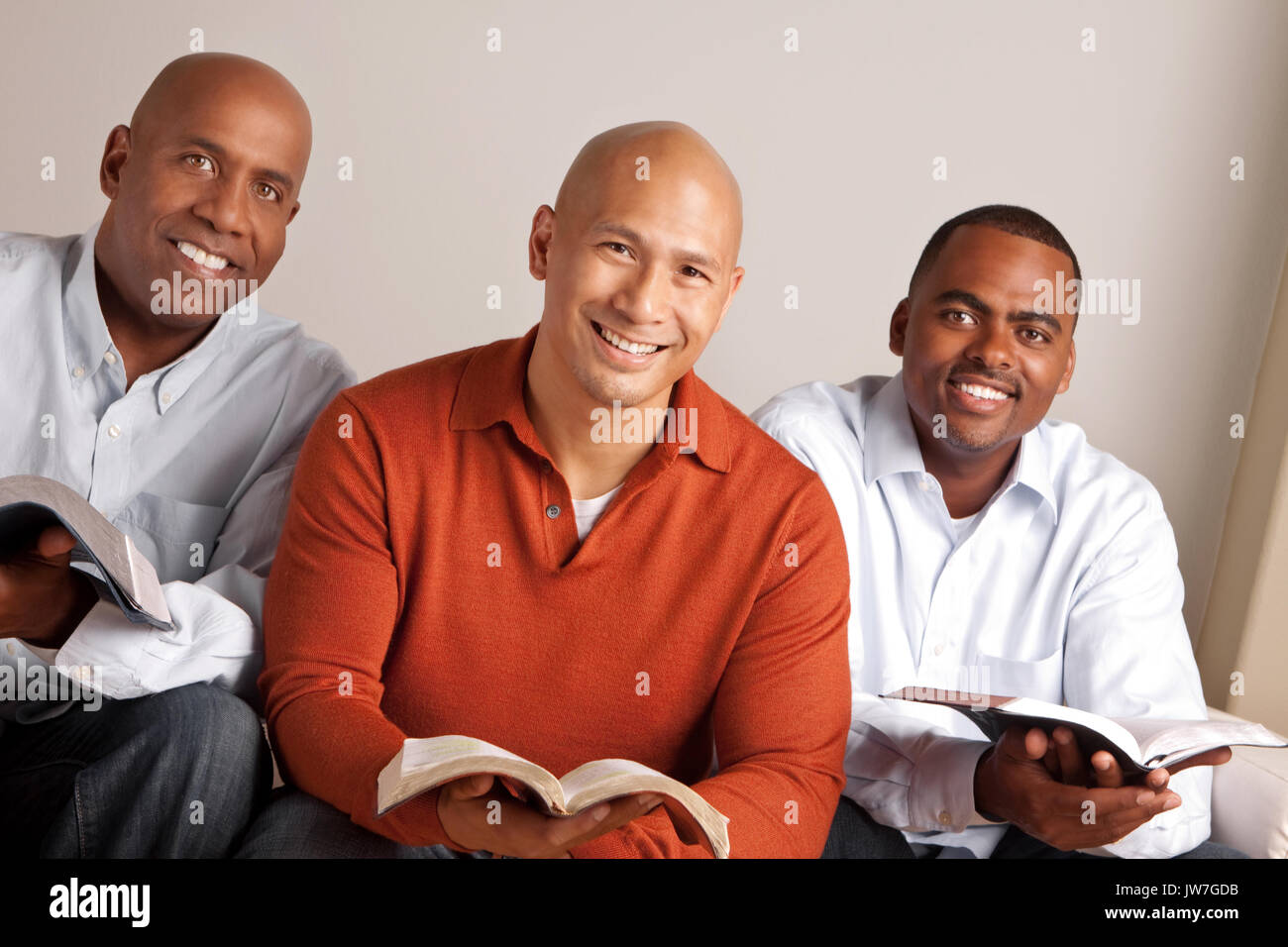 Diverse group of men studying together Stock Photo - Alamy