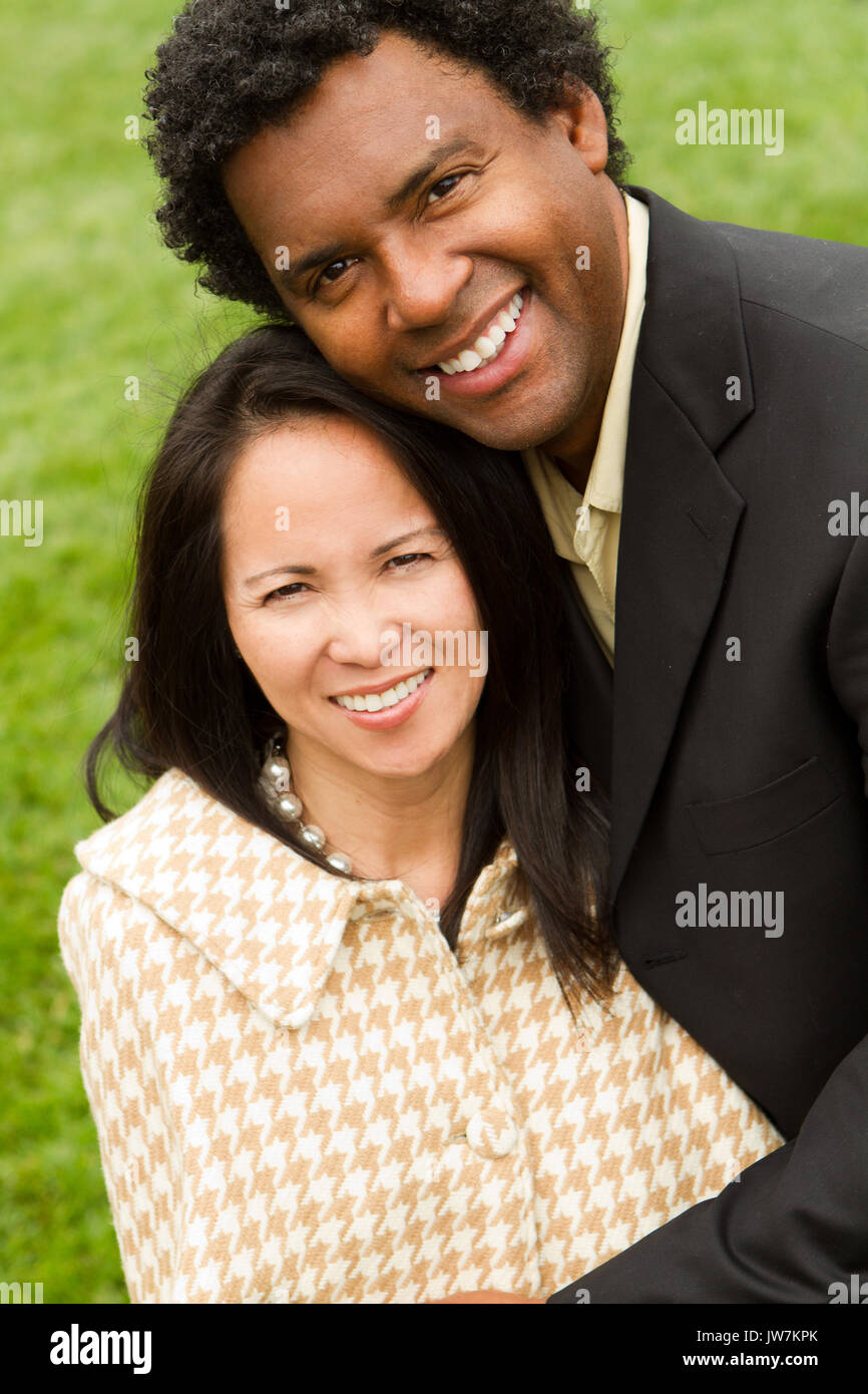 Happy biracial couple Stock Photo - Alamy