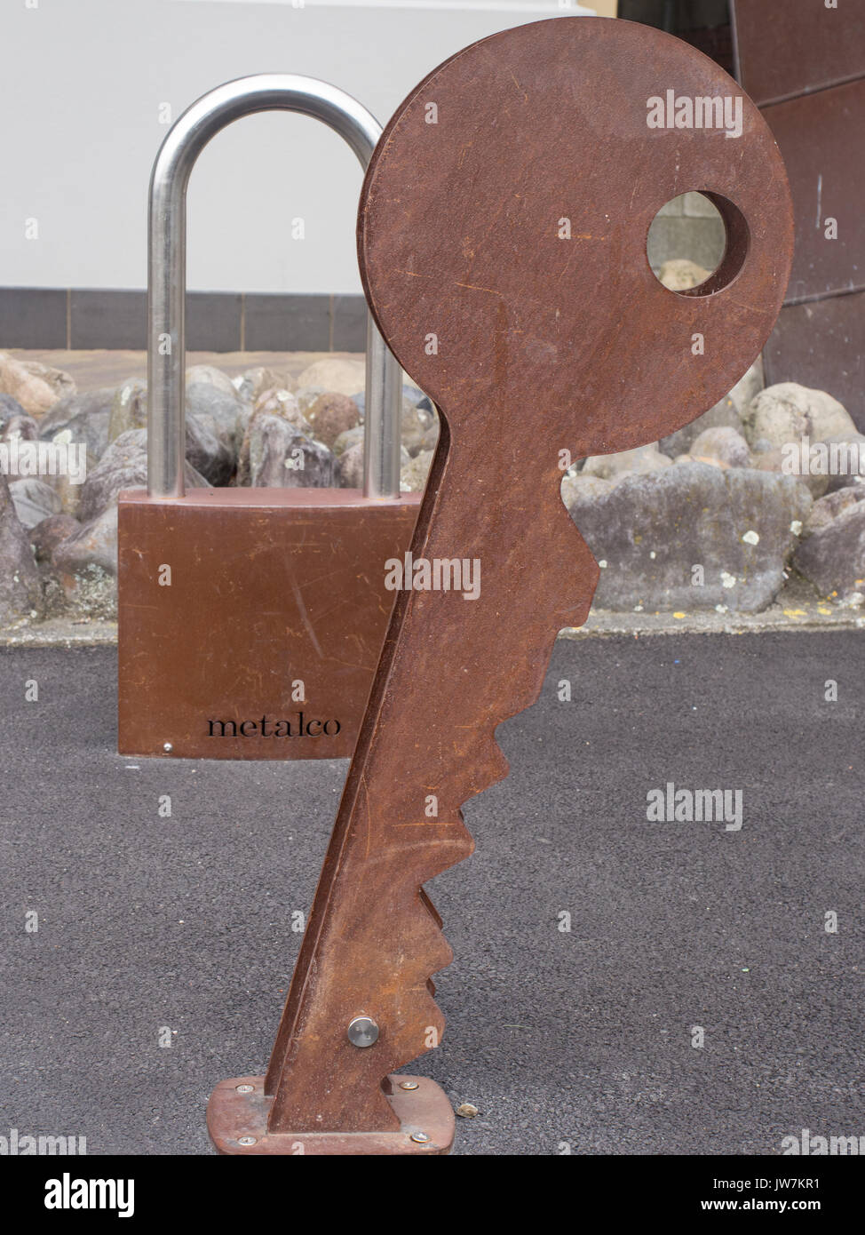 Large Metal Key In Sidewalk Stock Photo - Alamy
