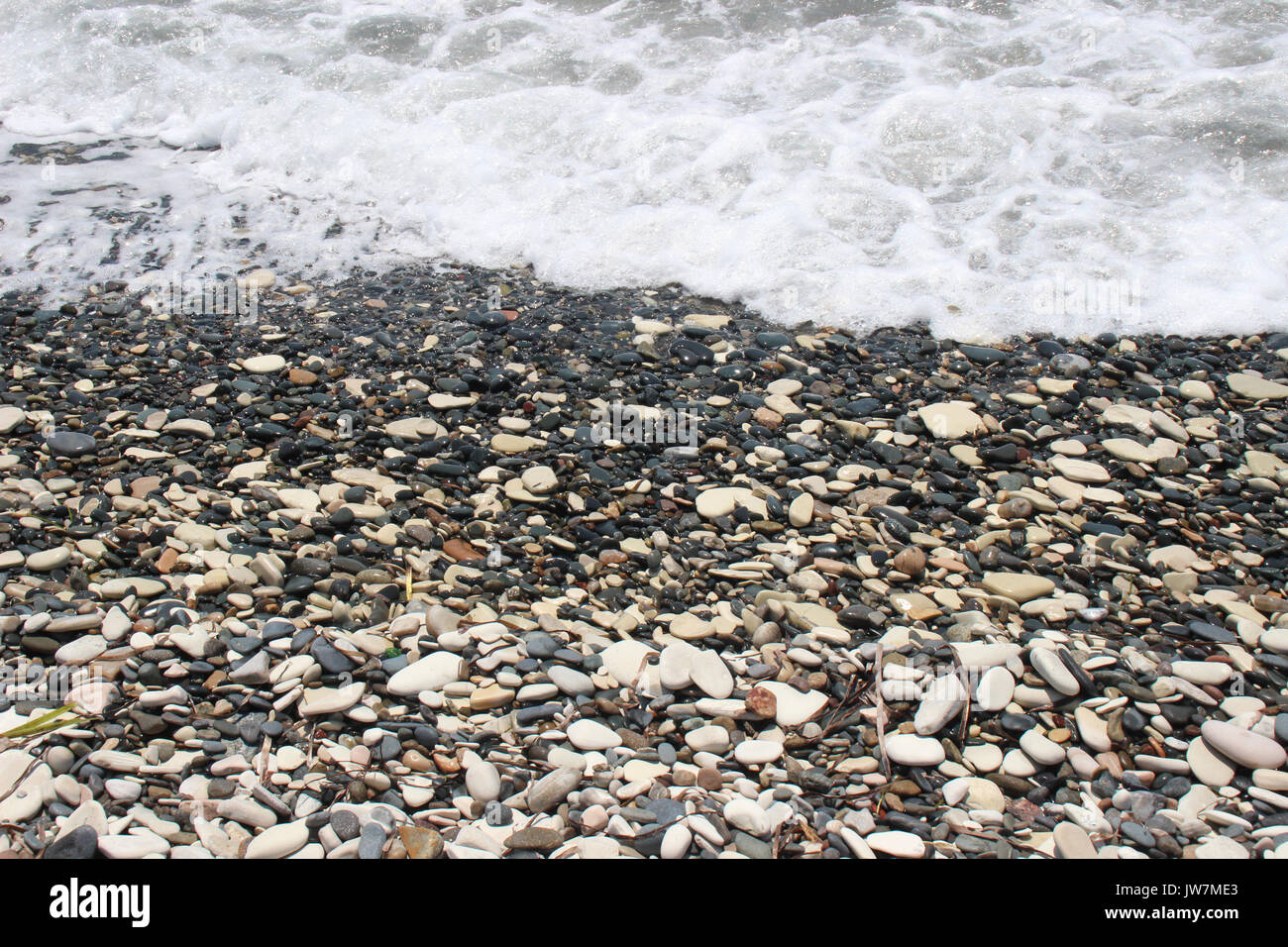 Pebbles on a Beach Stock Photo - Alamy