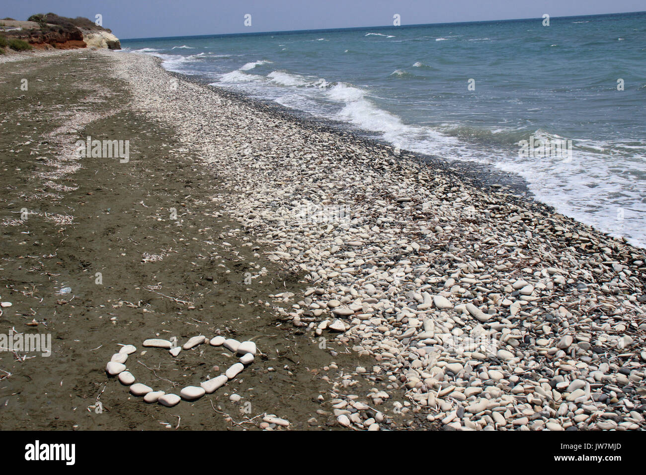 Pebble Heart on Beach Stock Photo - Alamy