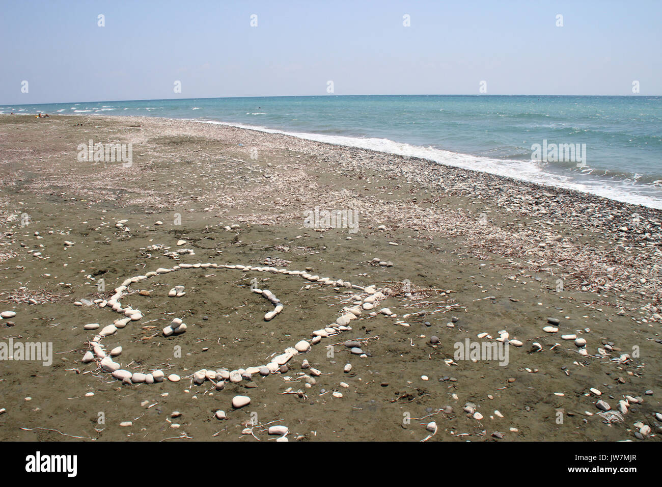 Pebble Heart on Beach Stock Photo - Alamy