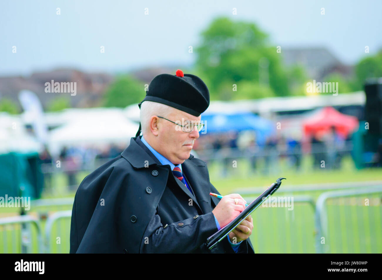 A male official judging in the British Pipe Band Championships held in ...