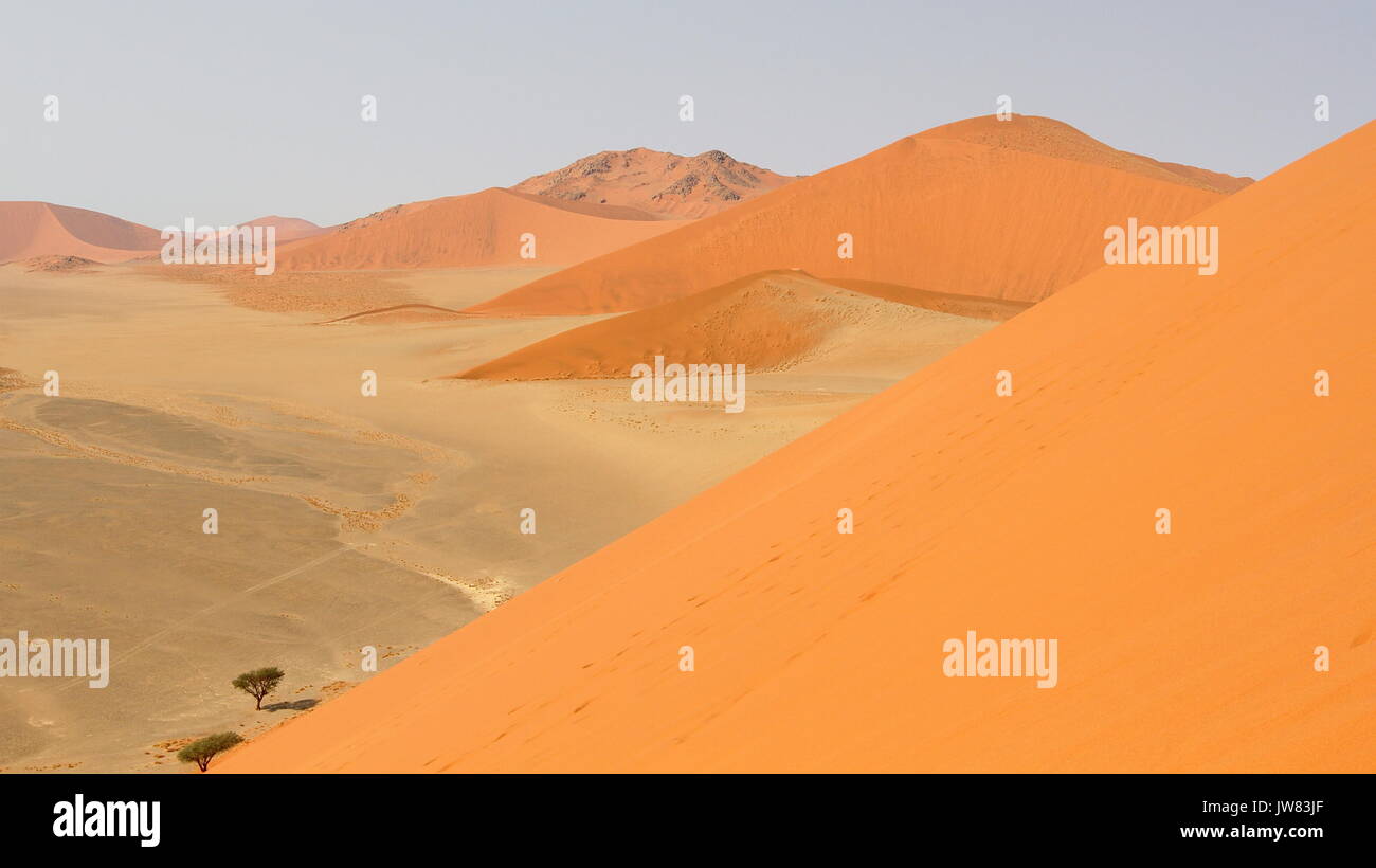 Orange sand Dunes that mark the beautiful and vast Namibian Desert ...