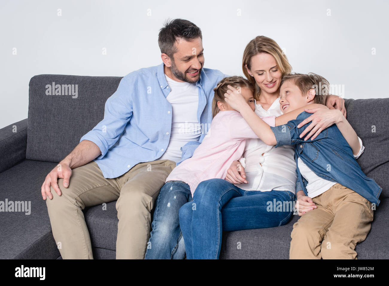 Family with two children sitting hi-res stock photography and images ...