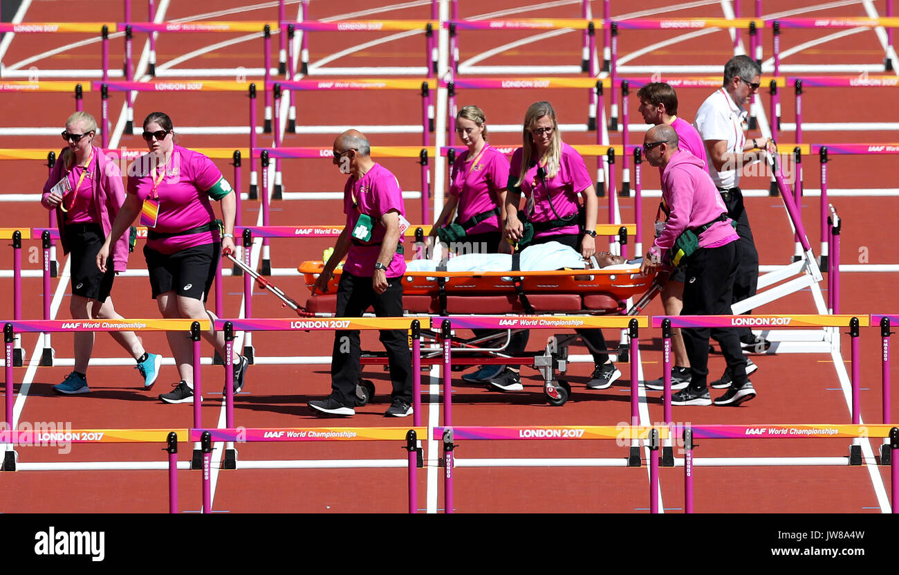Trinidad and Tobago's Deboard John is removed on a stretcher following ...