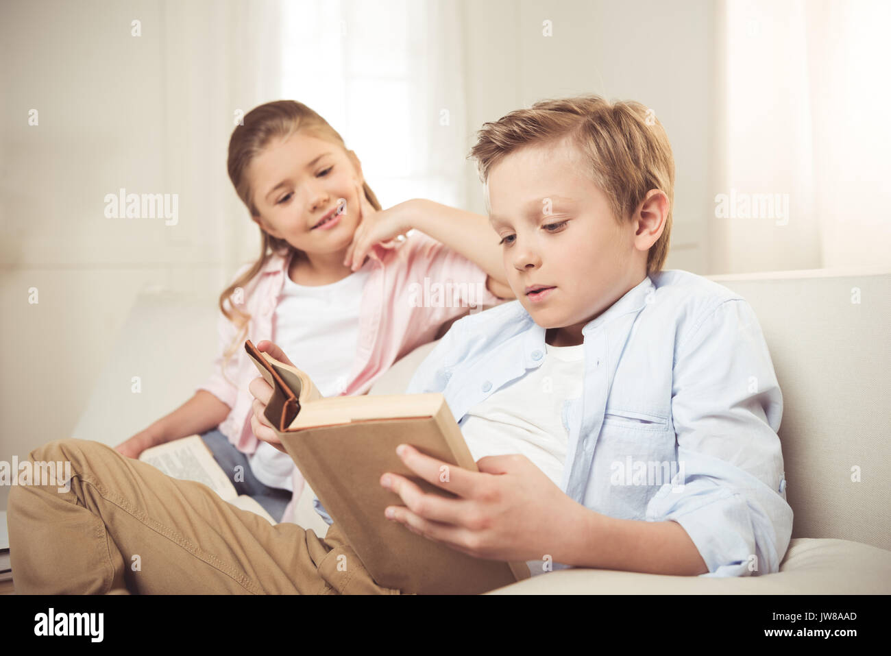 Smiling siblings brother sister friends hi-res stock photography and ...