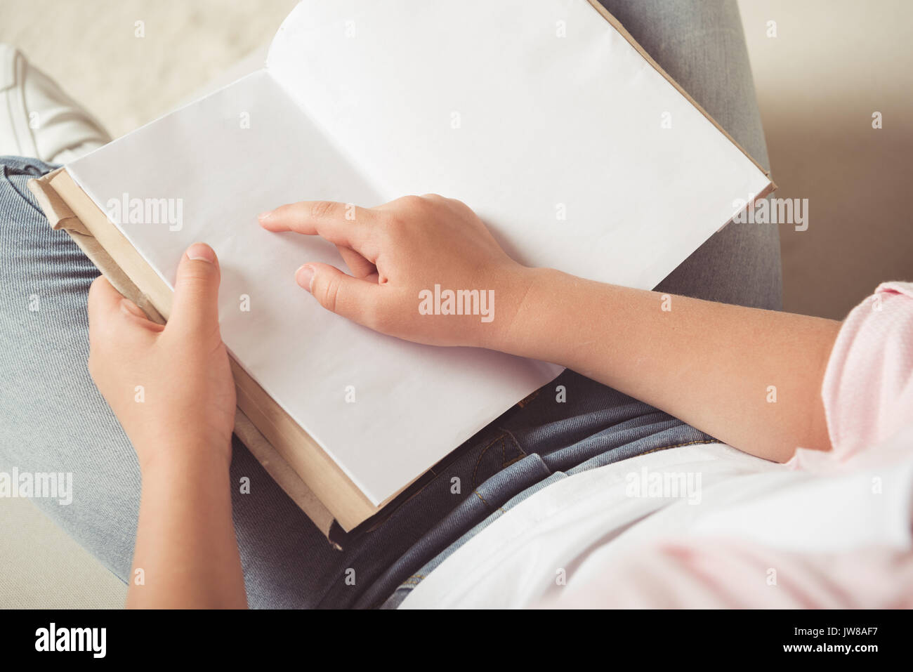 Pointing book child hi-res stock photography and images - Alamy