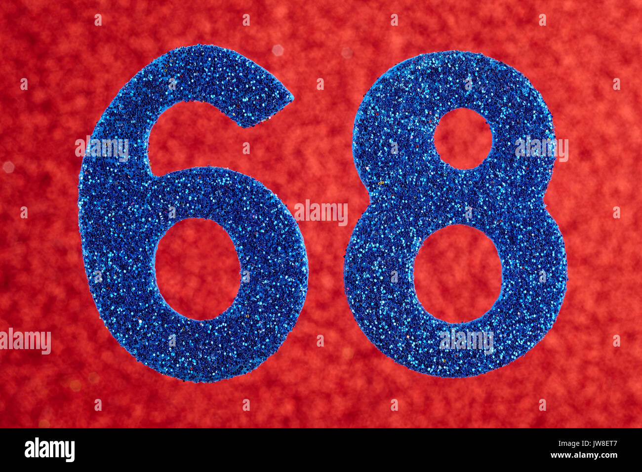 Number sixty-eight blue color over a red background. Anniversary ...