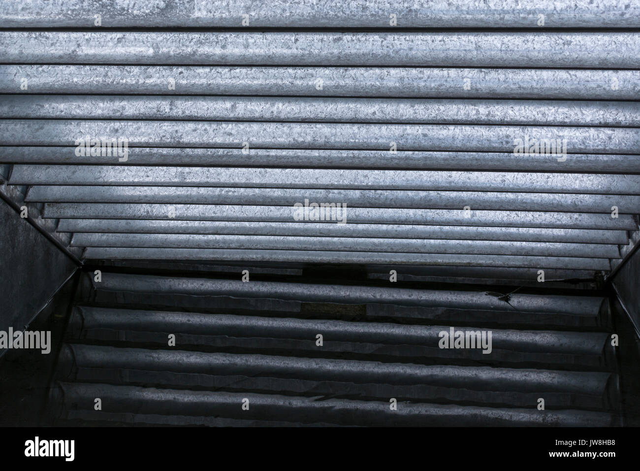 Abstract lines. Series of metal fins in an industrial air-conditioning ...