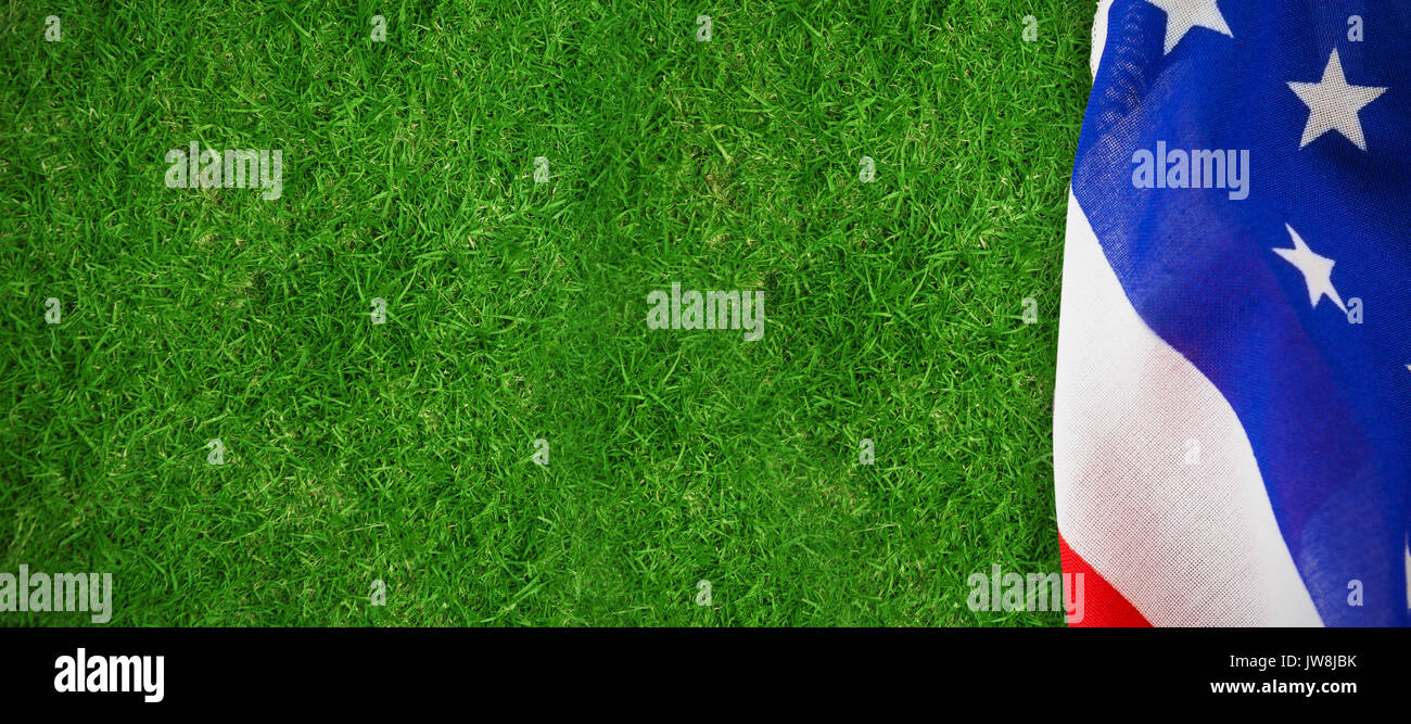 Close-up of American flag against closed up view of grass Stock Photo ...