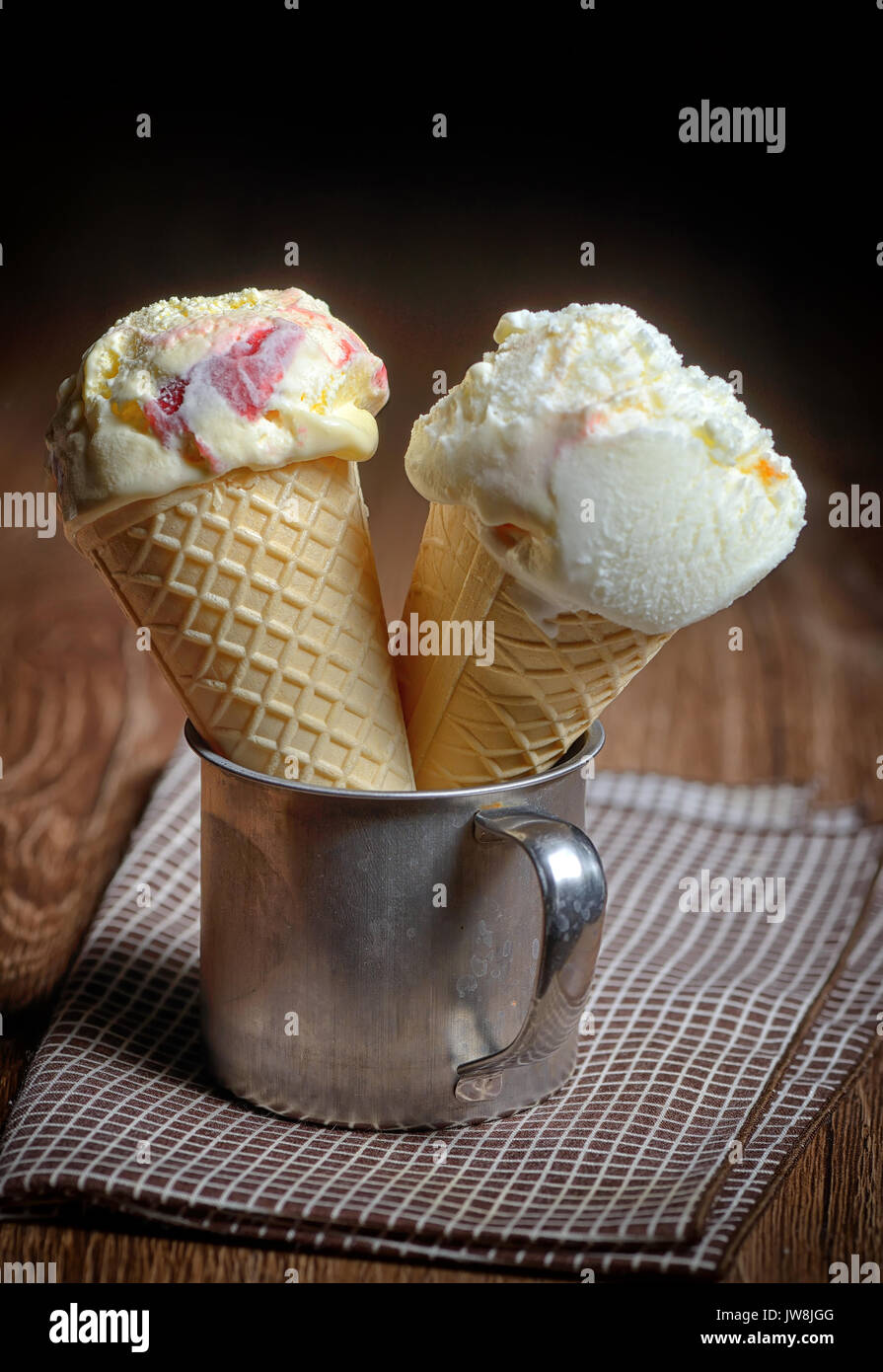 Two ice cream cones in mug Stock Photo - Alamy
