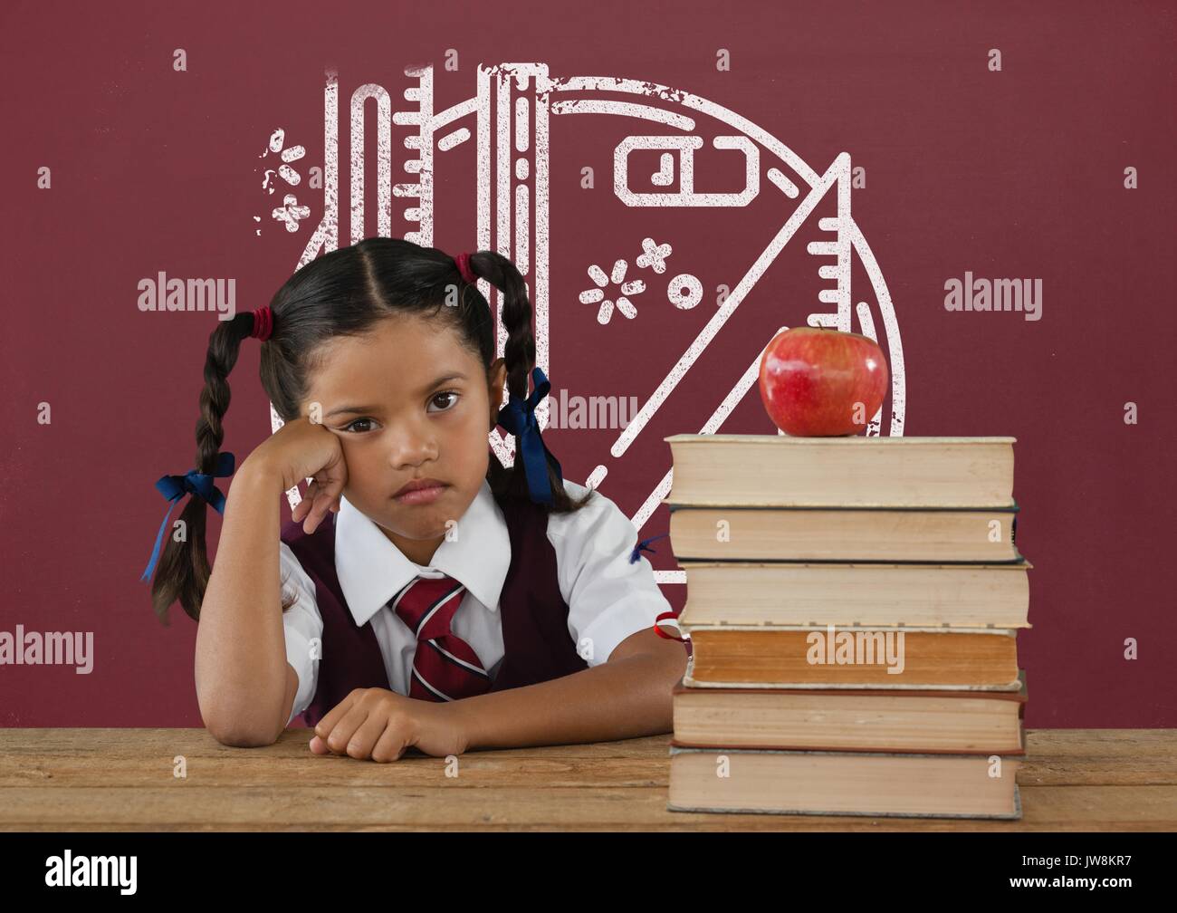 Digital composite of Student girl at table against red blackboard with ...