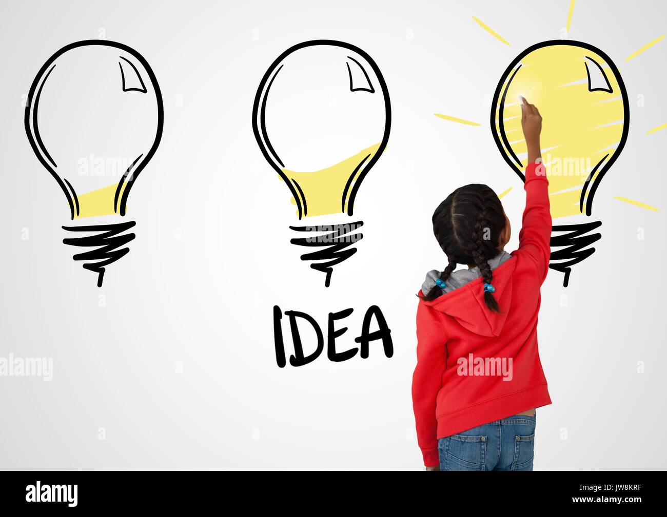 Digital composite of Girl drawing light bulbs idea Stock Photo - Alamy