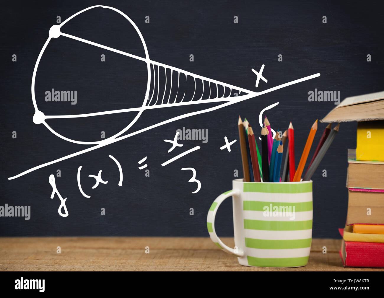Digital composite of Desk foreground with blackboard graphics of math ...