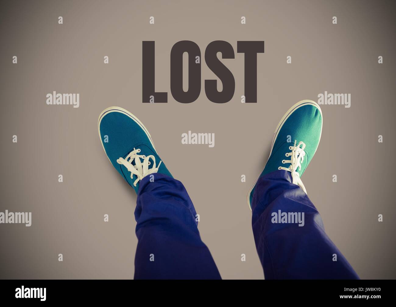 Digital composite of Lost text and Green shoes on feet with brown ...