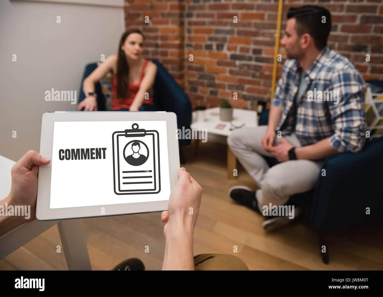 Digital composite of Comment text and graphic on tablet screen with ...