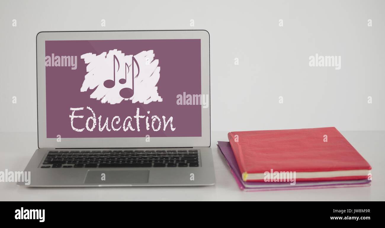 Digital composite of Computer on a school table with school icon on ...