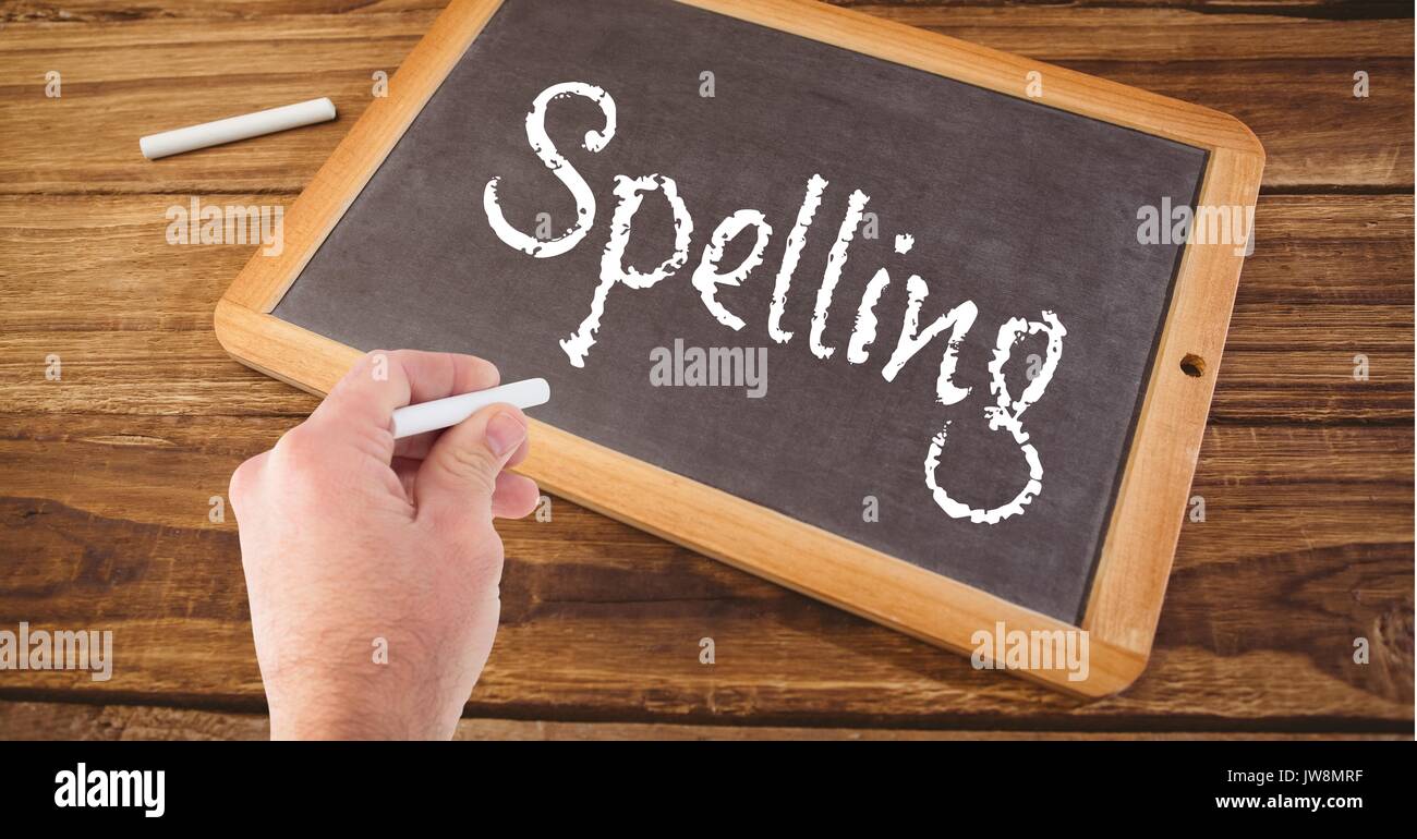 Digital composite of Hand writing spelling on blackboard Stock Photo ...