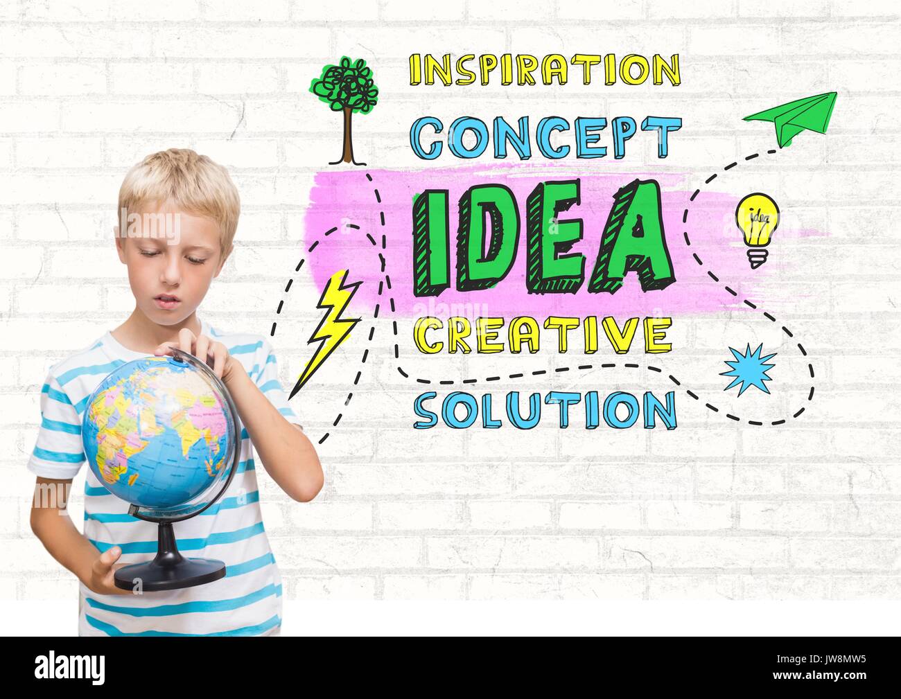 Digital composite of Boy holding world globe with colorful creative ...