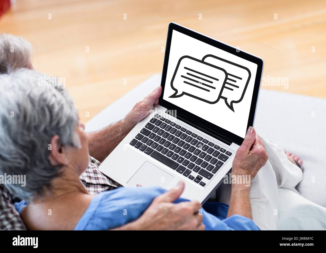 Digital composite of Chat graphic on laptop screen with Old people ...