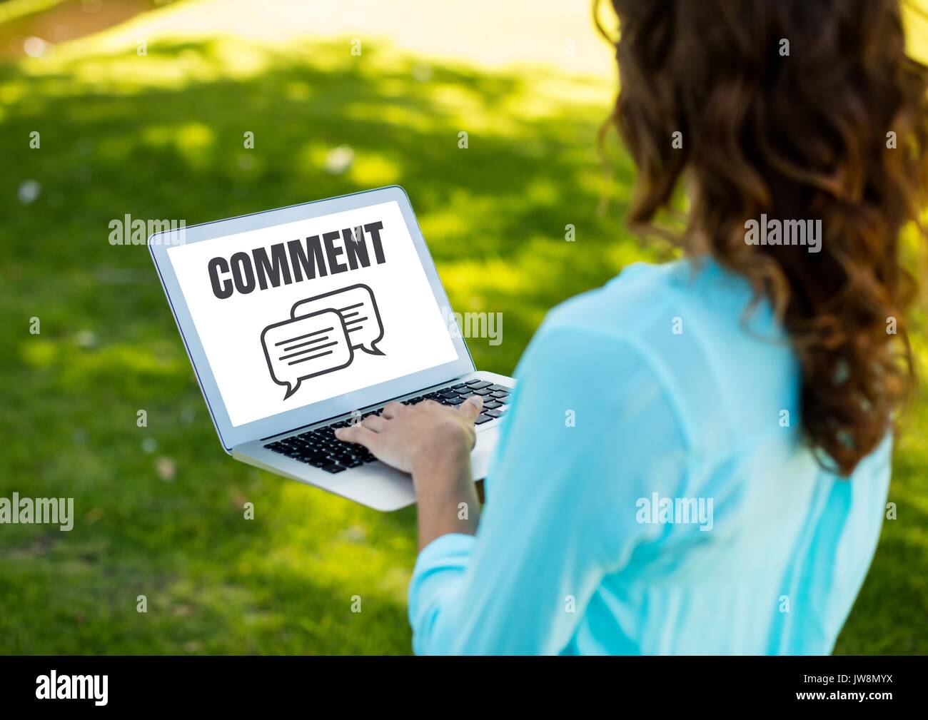 Digital composite of Comment text and chat graphic on laptop screen ...