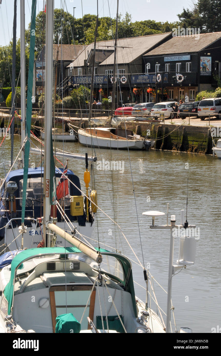 the bargemans rest public house and yachts alongside the wall moored at ...