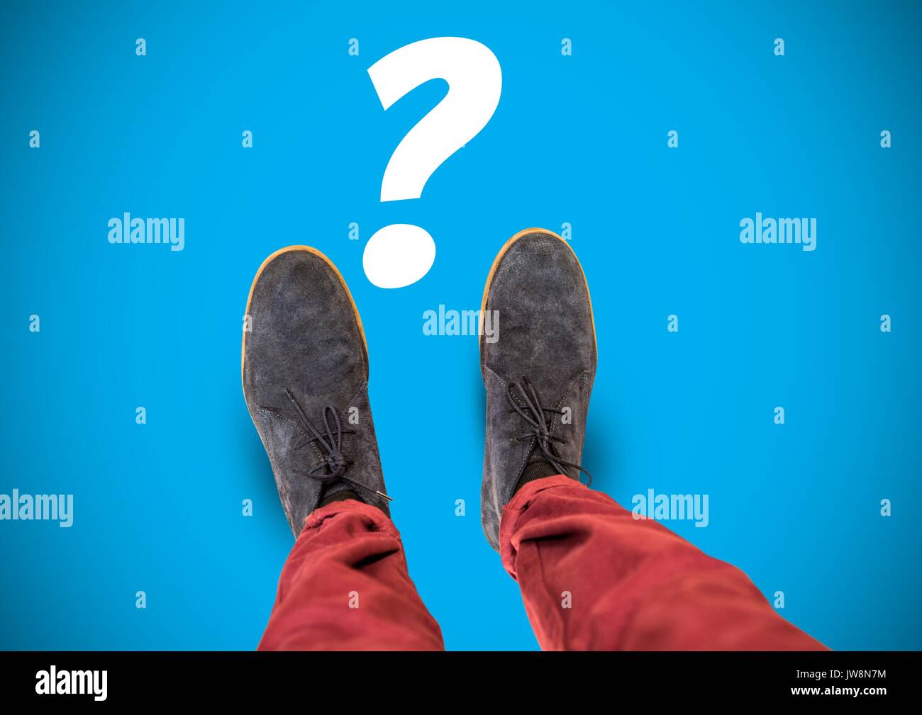 Digital composite of Question Mark and grey shoes on feet with blue ...