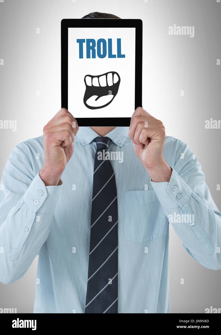 Digital composite of Troll text with cartoon mouth on tablet over mans ...
