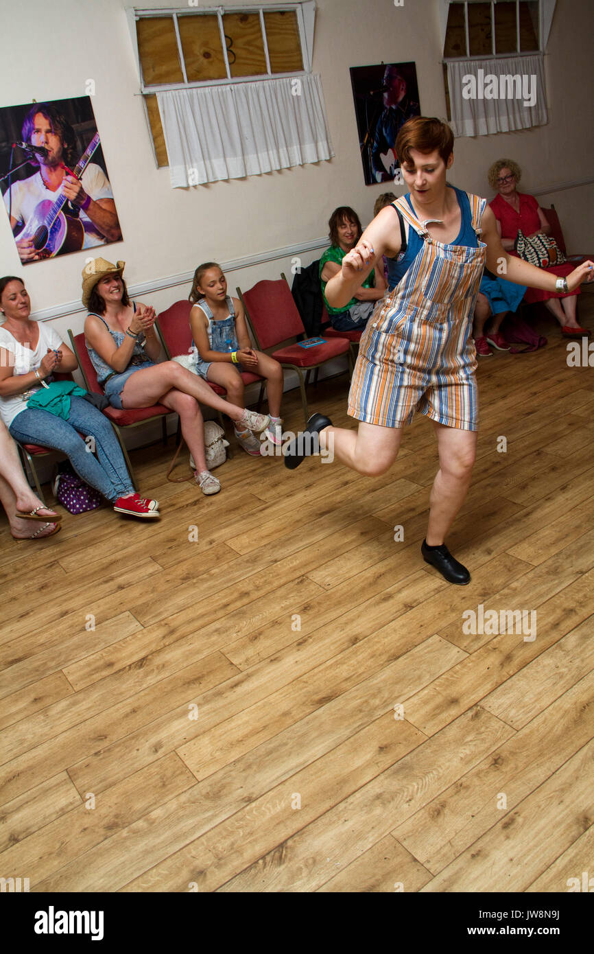 At the Maverick music festival a young woman demonstrates step dancing ...