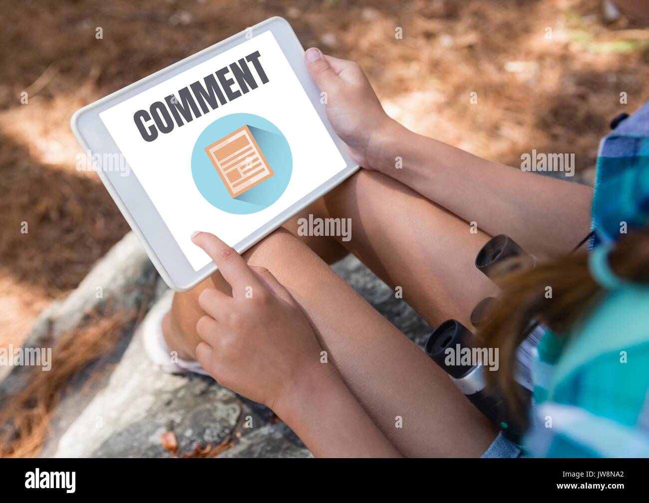 Digital composite of Comment text and graphic on tablet screen with ...