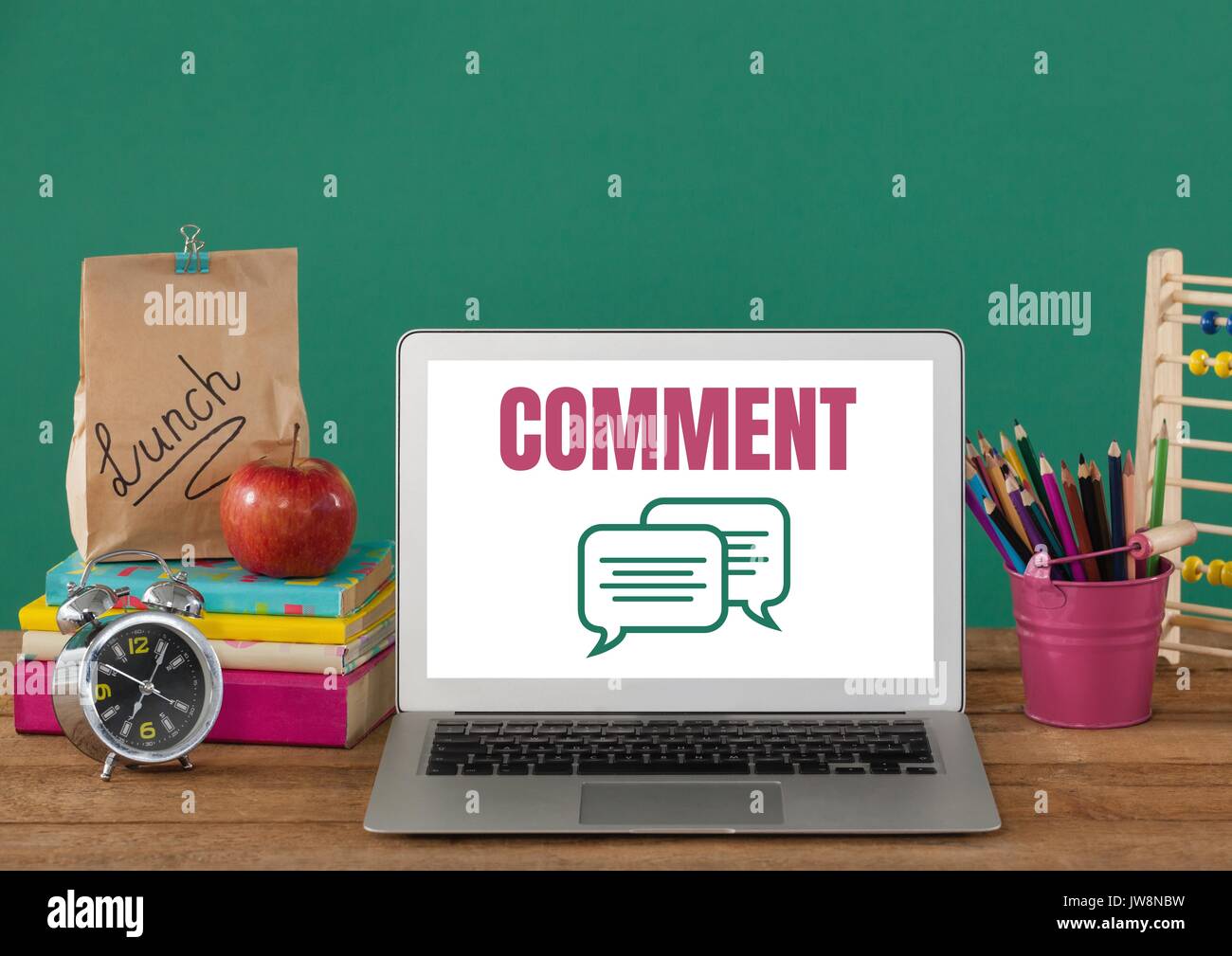 Digital composite of Comment text and chat graphic on laptop screen ...