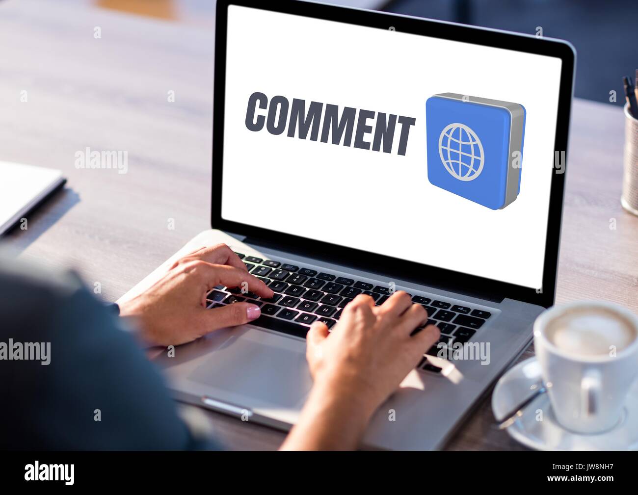 Digital composite of Comment text and world graphic on laptop screen ...