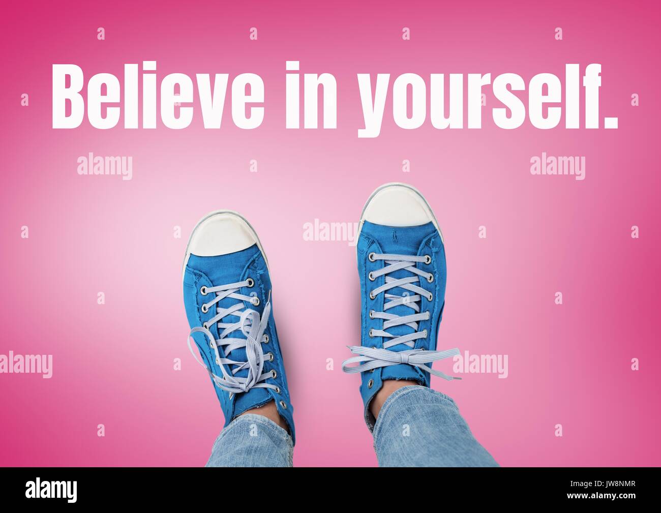 Digital composite of Believe in yourself text and Blue shoes on feet ...