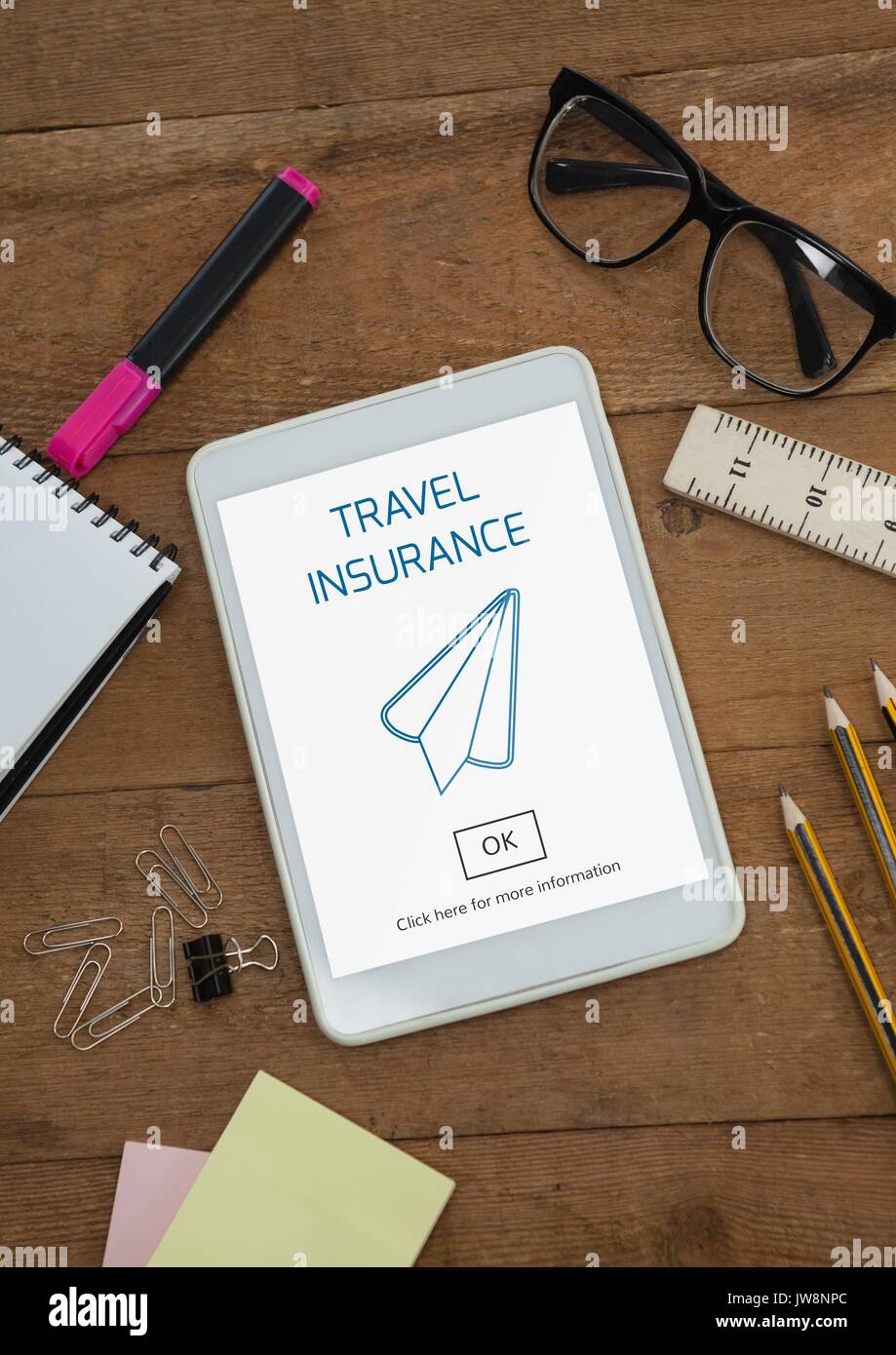 Digital composite of Tablet with travel insurance concept on screen ...