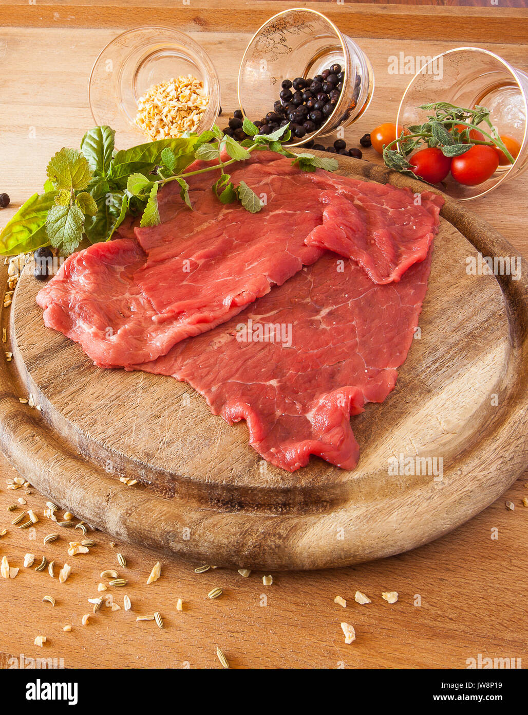Beef raw beef on a wooden chopping board,ambient light Stock Photo - Alamy