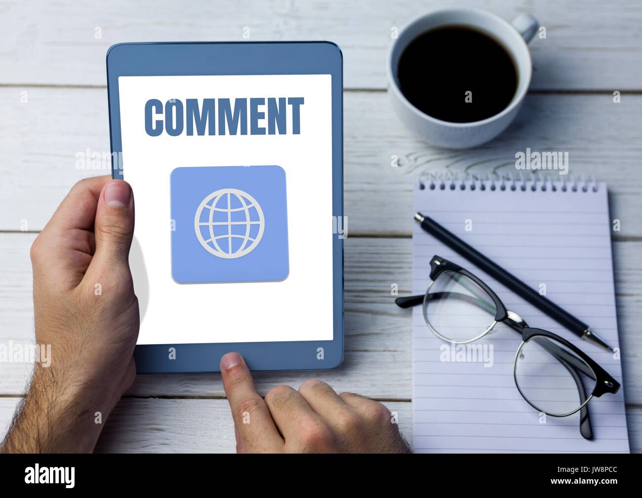Digital composite of Comment text and world graphic on tablet screen ...