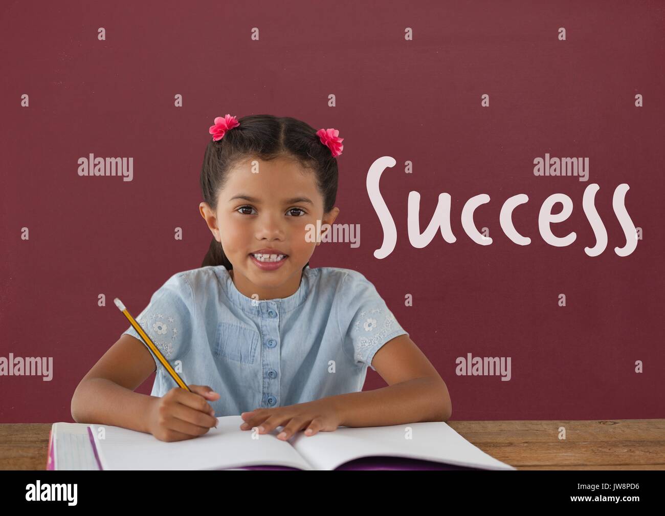 Digital composite of Student girl at table against red blackboard with ...